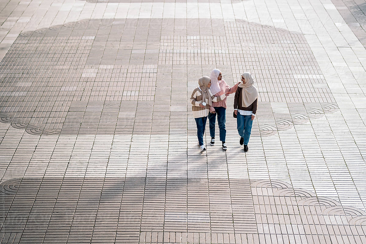 "Three Muslim Women Walking On The Streets." by Stocksy Contributor ...