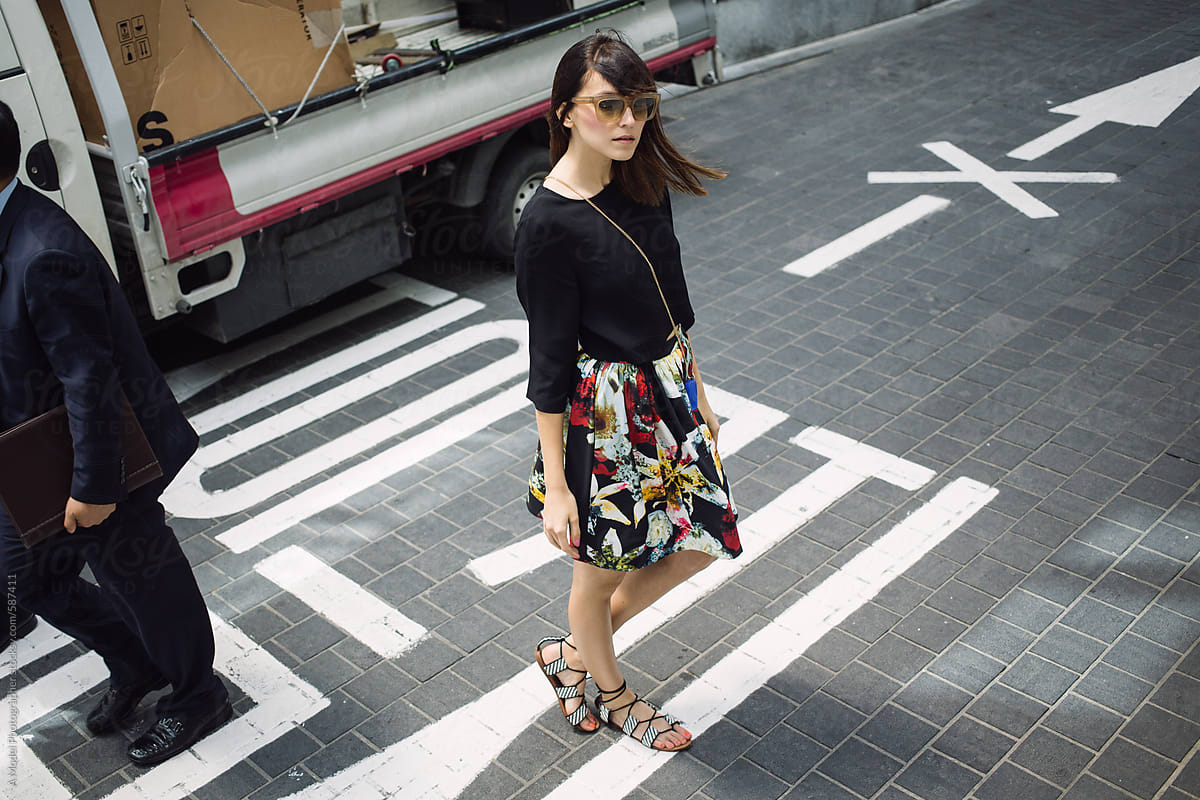 "Outfit Inspiration - Stylish Girl Standing The Steet" by Stocksy ...