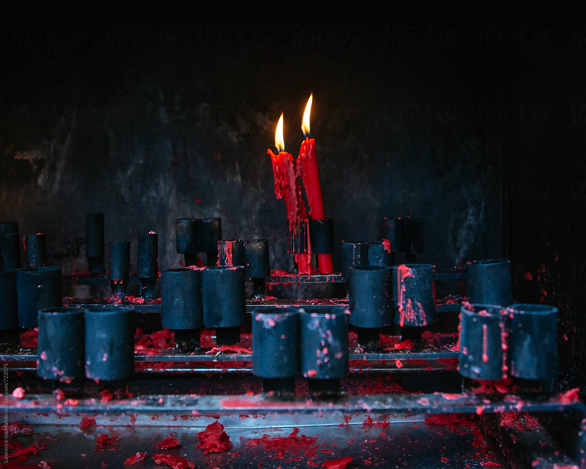 "A Couple Of Lighted Red Candles In A Temple" by Stocksy Contributor ...