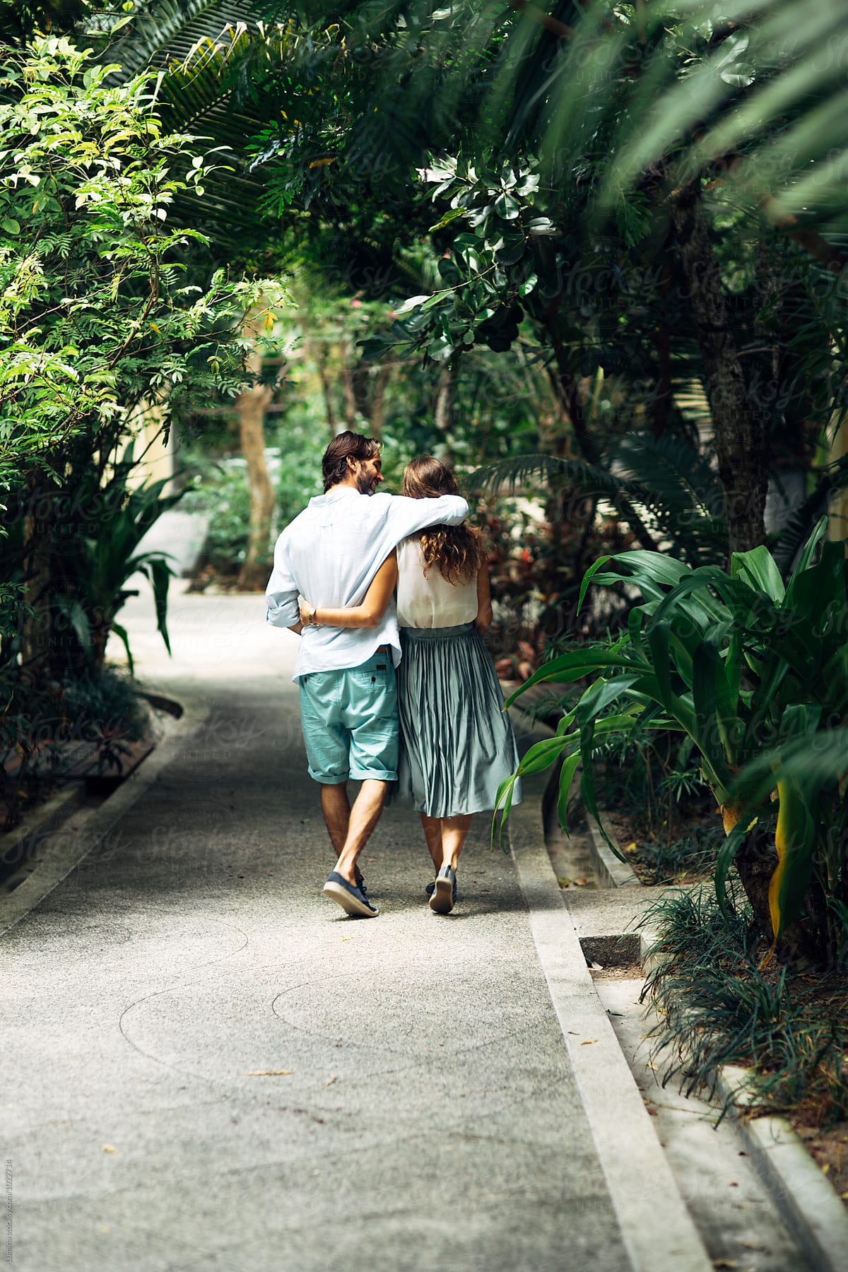 "Couple Having A Walk In A Garden" by Stocksy Contributor "Lumina ...