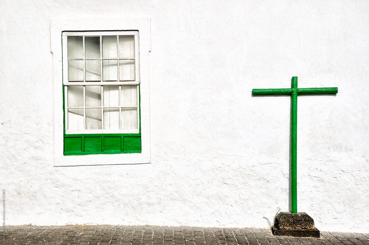 "Green Cross In Front Of A House" by Stocksy Contributor "Bisual Studio ...