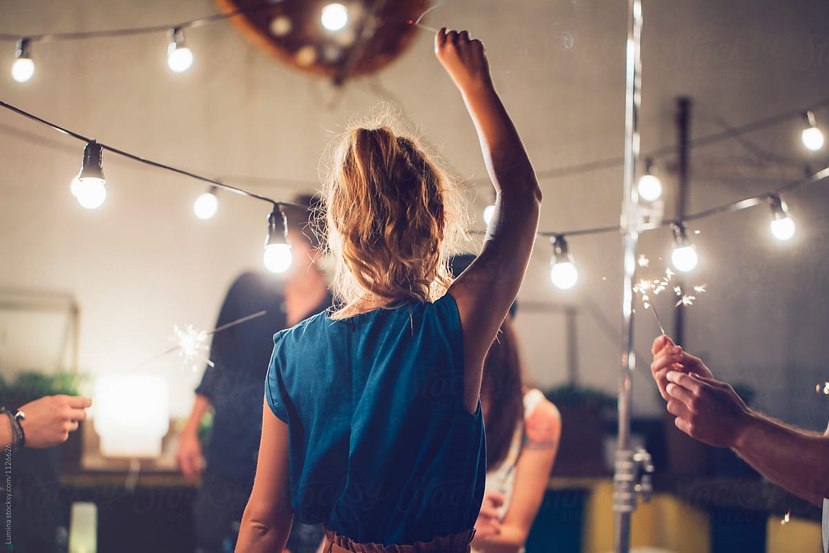 "Woman Dancing At Outdoor Party" by Stocksy Contributor "Lumina" - Stocksy