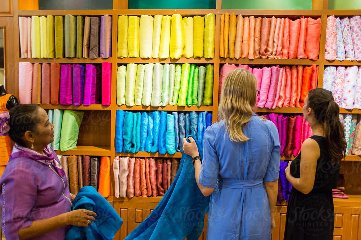 "Ladies In An Exotic Fabric Store" by Stocksy Contributor "Jovo ...