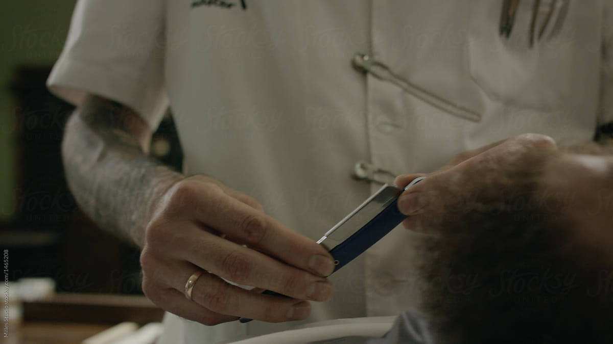 "Professional Barber Grooming Client" by Stocksy Contributor "Milles ...