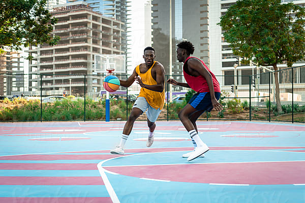 People Playing Basketball Outside