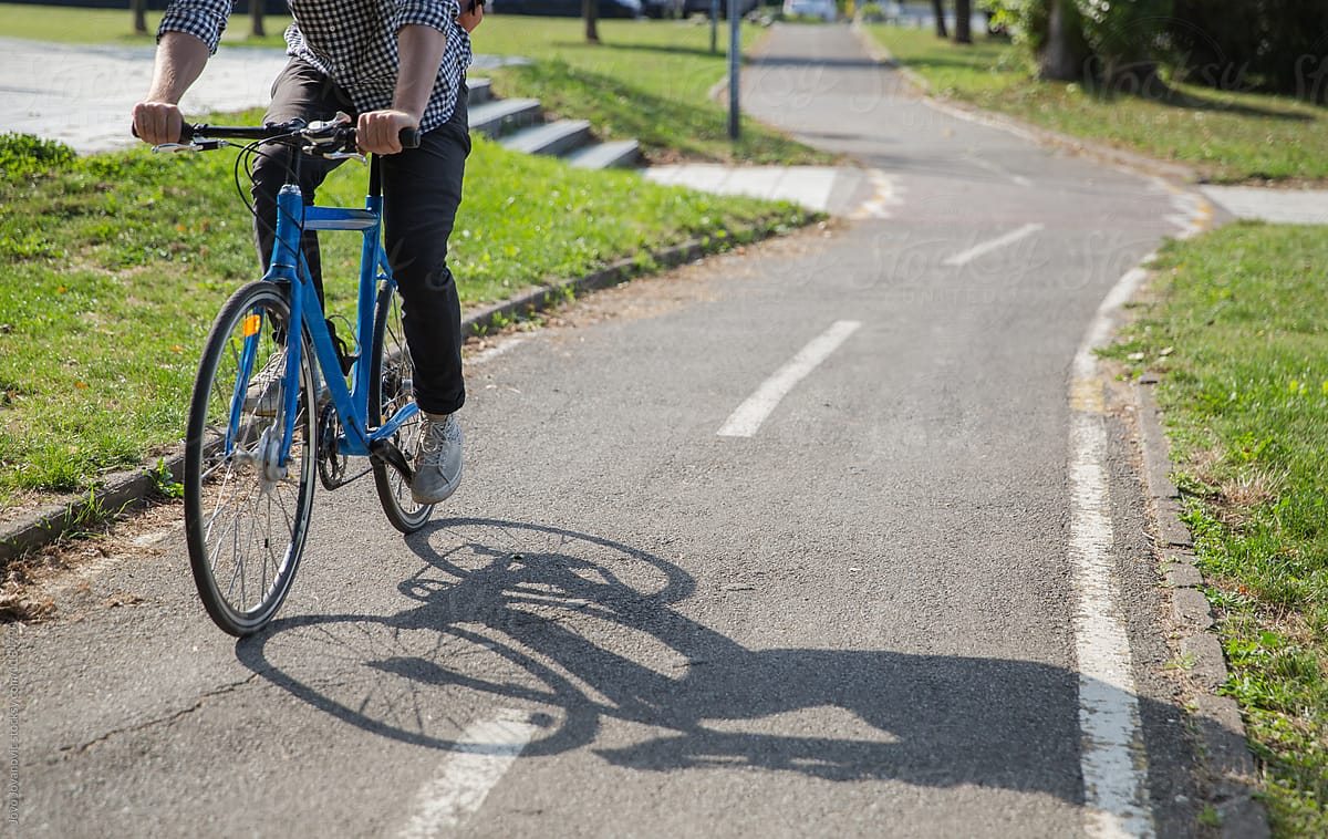 "Man On A Bike In The City" by Stocksy Contributor "Jovo Jovanovic ...