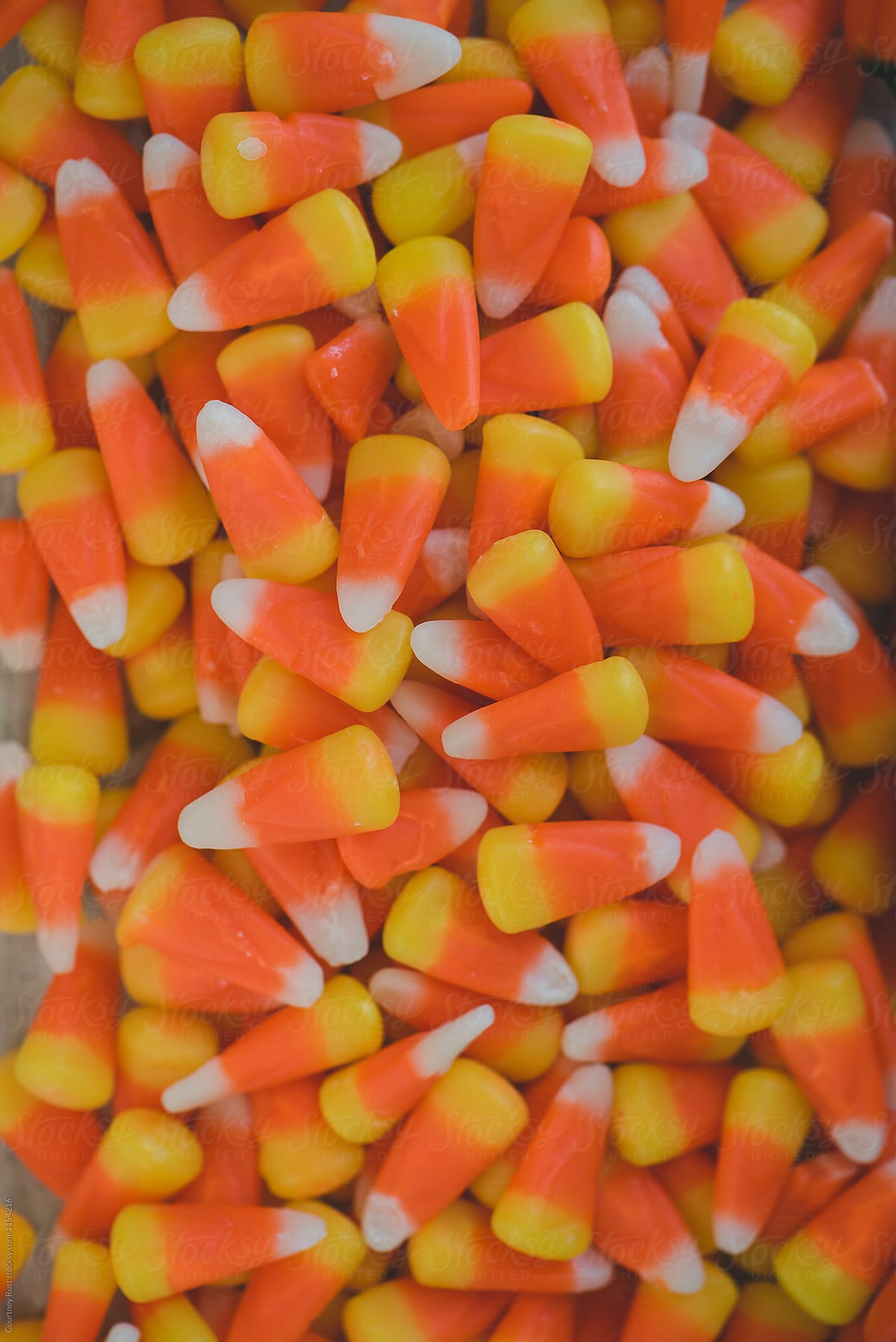 "Vertical Candy Corn" by Stocksy Contributor "Courtney Rust" - Stocksy