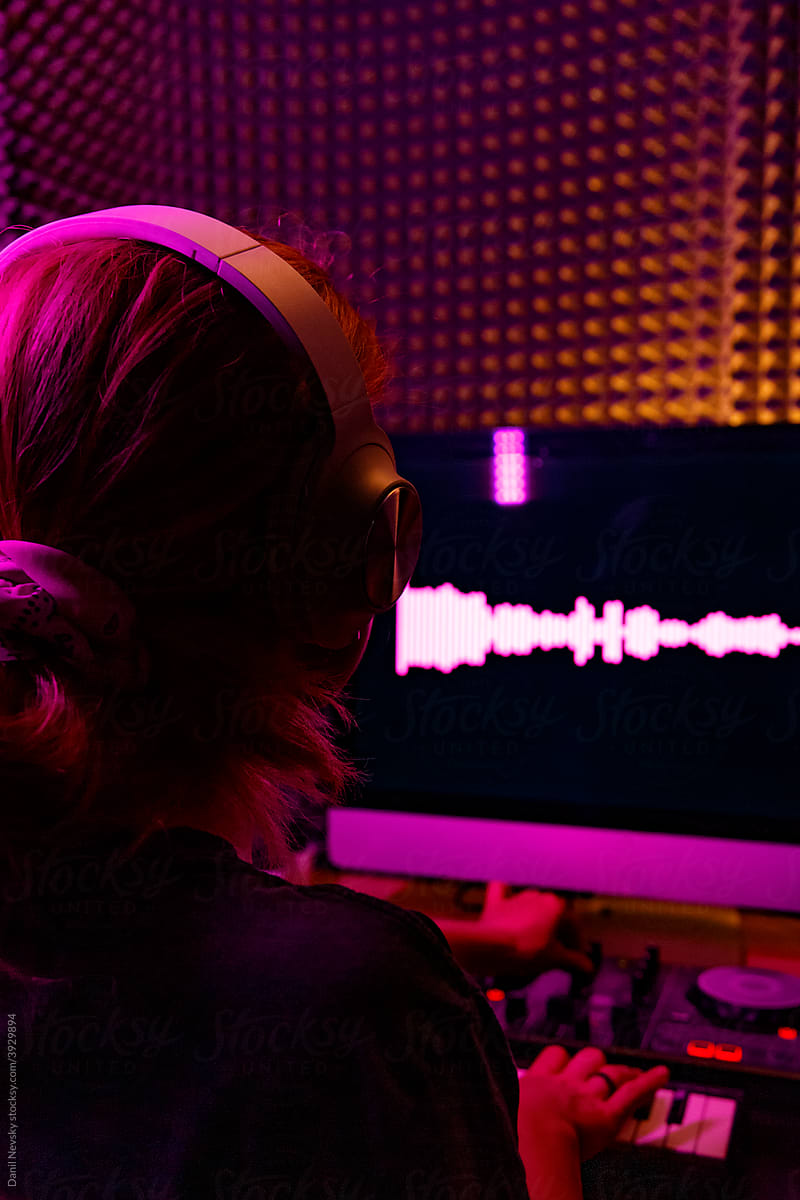 "Unrecognizable DJ Recording Audio Track On Computer In Studio" by ...