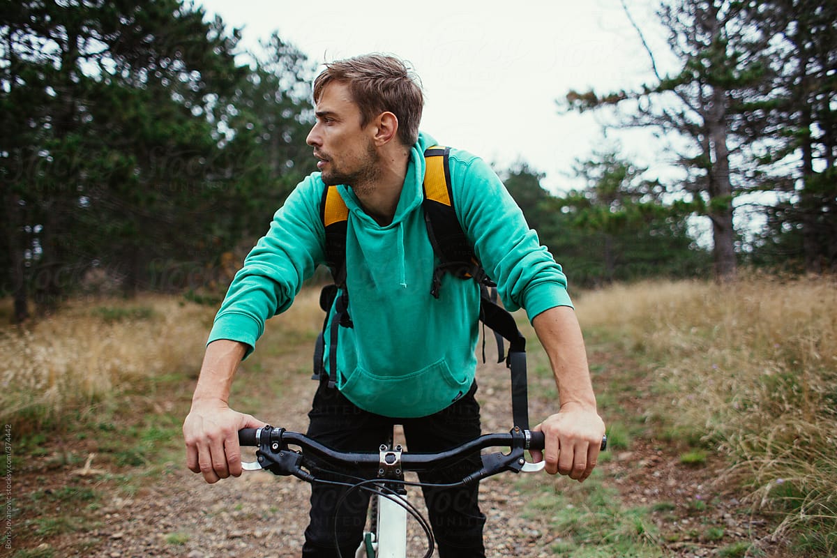 "Man Cycling In The Mountains" by Stocksy Contributor "Boris Jovanovic ...