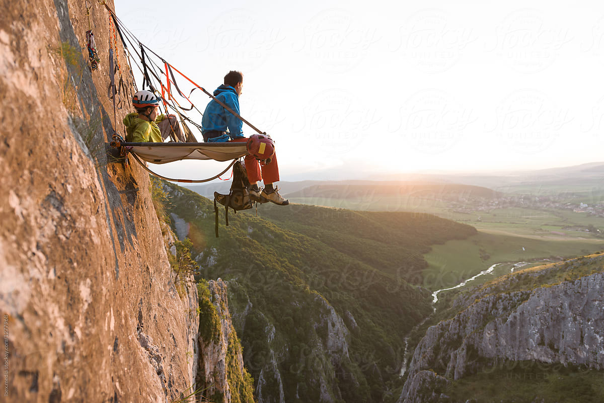 "Two Climbers Watching The Sunset From Their Portaledge" by Stocksy ...