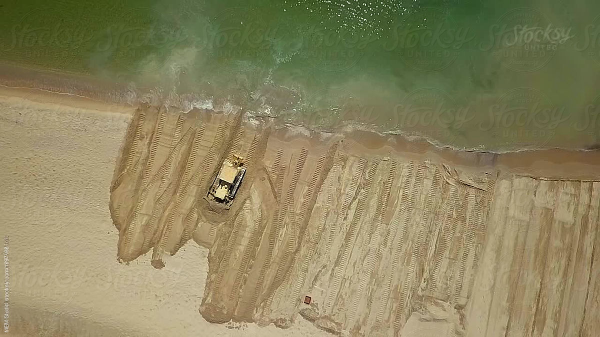 "Excavator Repairing The Beach After Winter Storms" by Stocksy ...