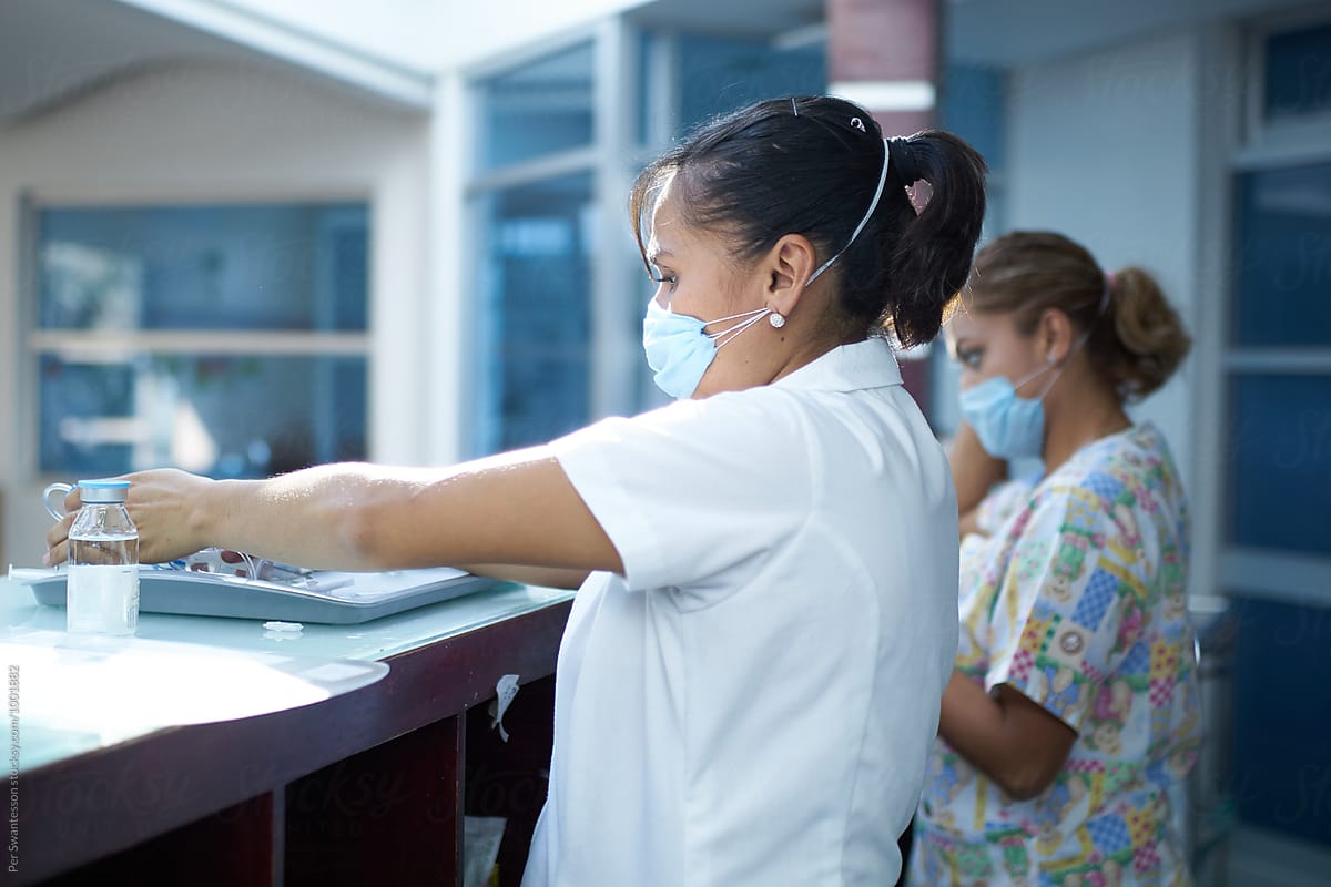 "Two Nurses Preparing Treatments For A Patients" by Stocksy Contributor ...