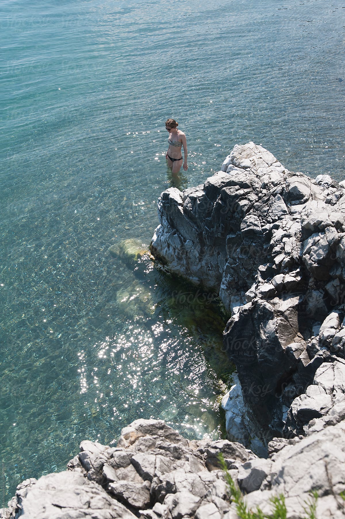 "Wading On The Coast" by Stocksy Contributor "Anthon Jackson" - Stocksy