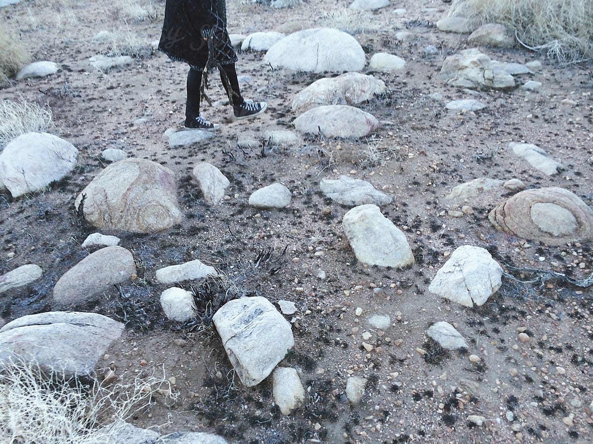 "Woman Walking On Desert Rocks" by Stocksy Contributor "Kevin Russ ...
