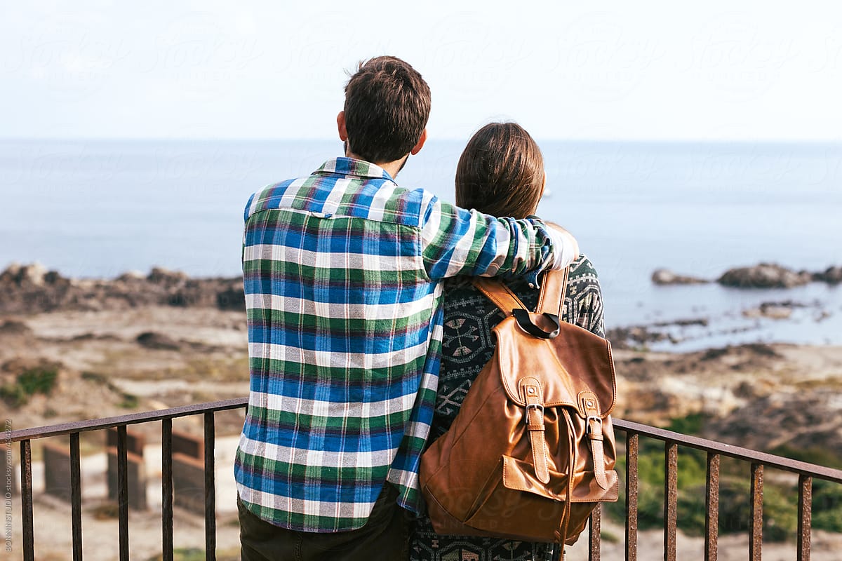 "Young Couple Looking Seascape From A Viewpoint." by Stocksy ...