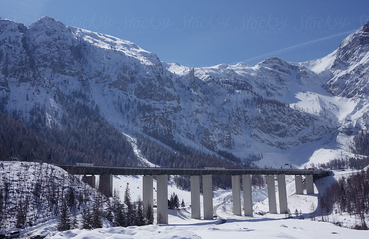 "Highway Bridge In Alps Landscape" by Stocksy Contributor "Robert ...