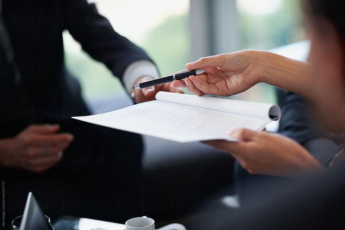"Investor Signing A Contract In A Business Meeting" by Stocksy ...