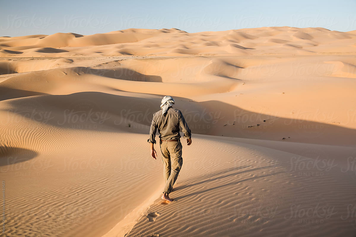 "A Solitary Man In A Desert" by Stocksy Contributor "Mauro Grigollo ...