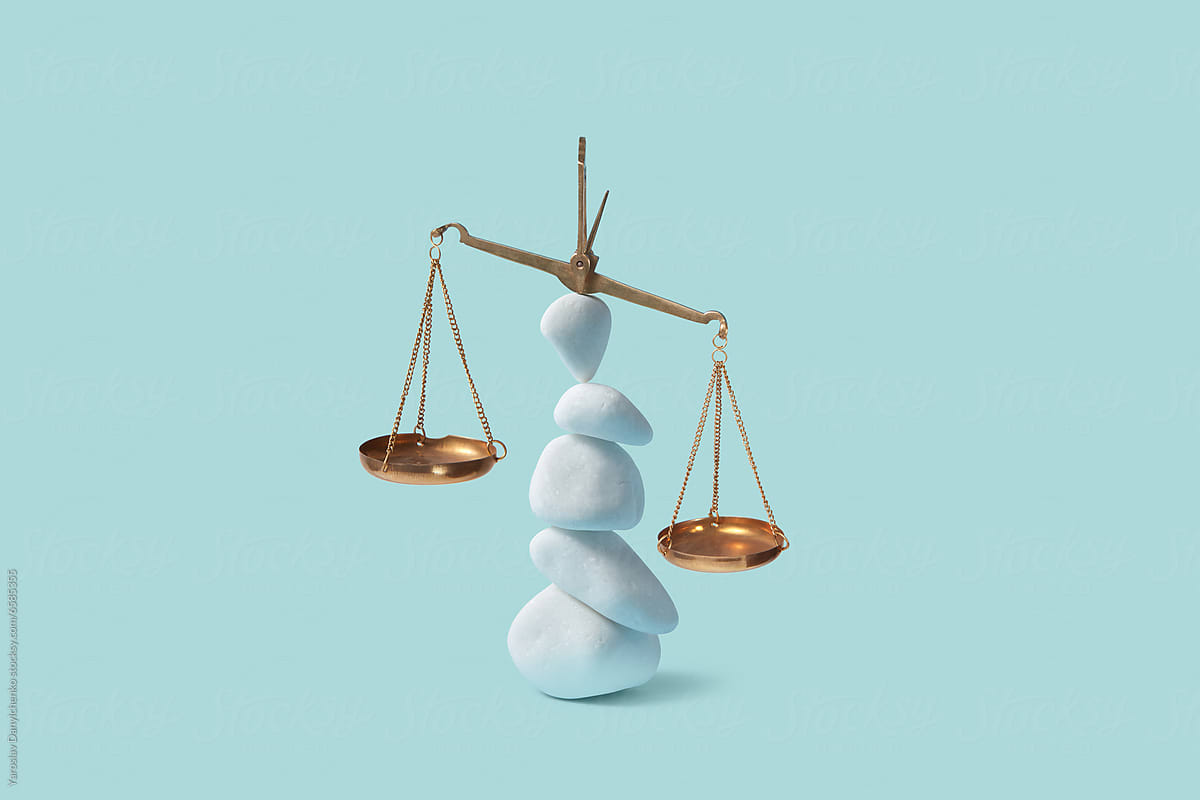 "Empty Golden Scale Balancing On Stack Of White Pebbles" by Stocksy ...