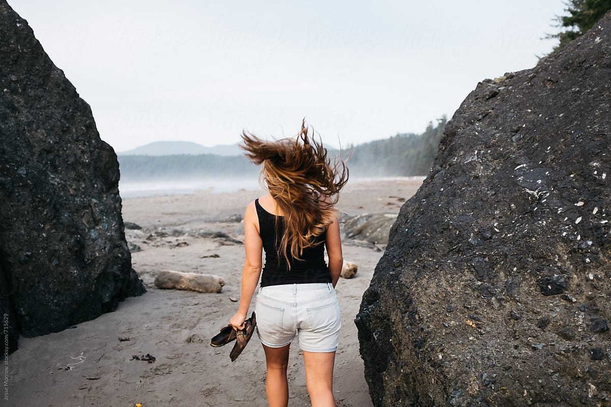 "Young Female Flipping Hair On Beach" by Stocksy Contributor "Jesse ...