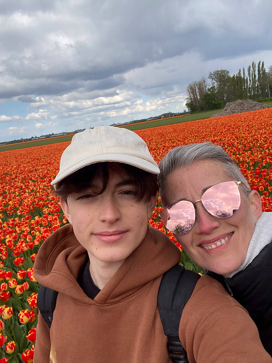 "Mother And Son In The Tulip Fields In The Netherlands" by Stocksy ...