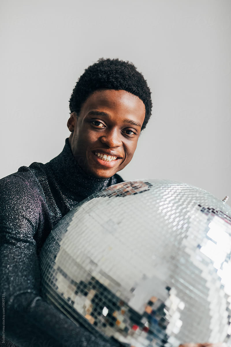 Portrait of man with disco ball - Stock Image - Everypixel
