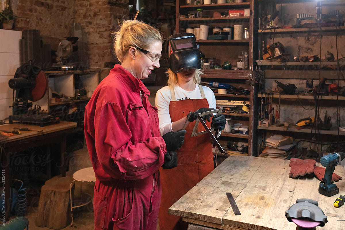 "Women Working Together In A Workshop" by Stocksy Contributor "Jelena ...