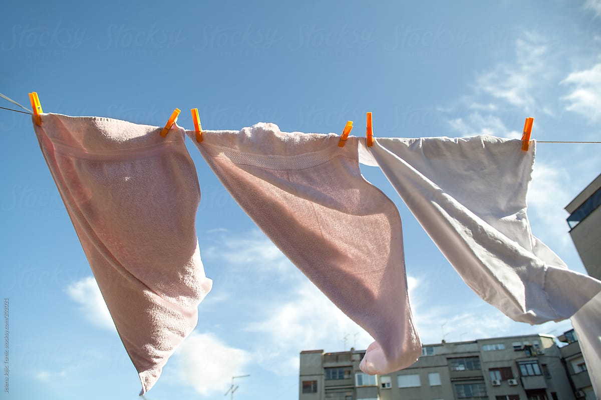 "Drying Laundry On The Clothesline" by Stocksy Contributor "Jelena ...