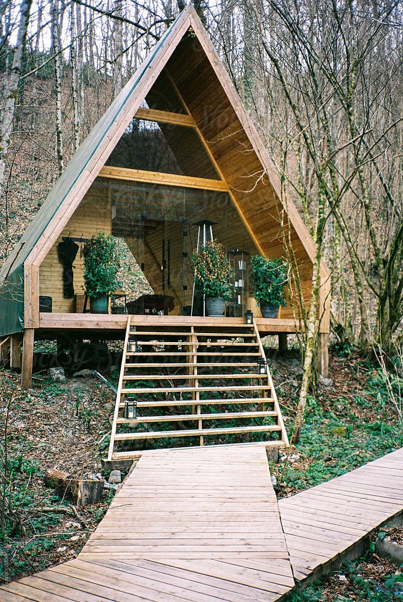 "Wooden House" by Stocksy Contributor "Synchro Shoot" - Stocksy
