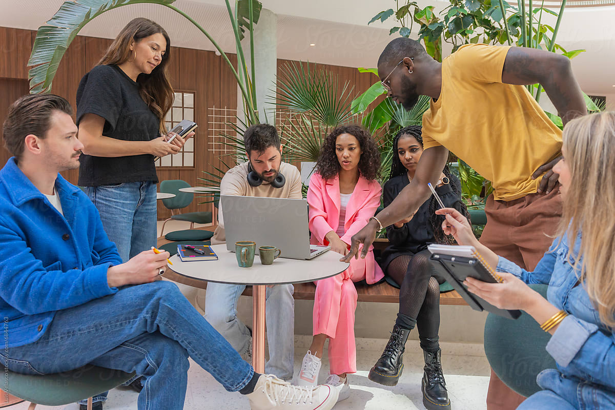 "Team Collaboration In Modern Office" by Stocksy Contributor "Luis ...