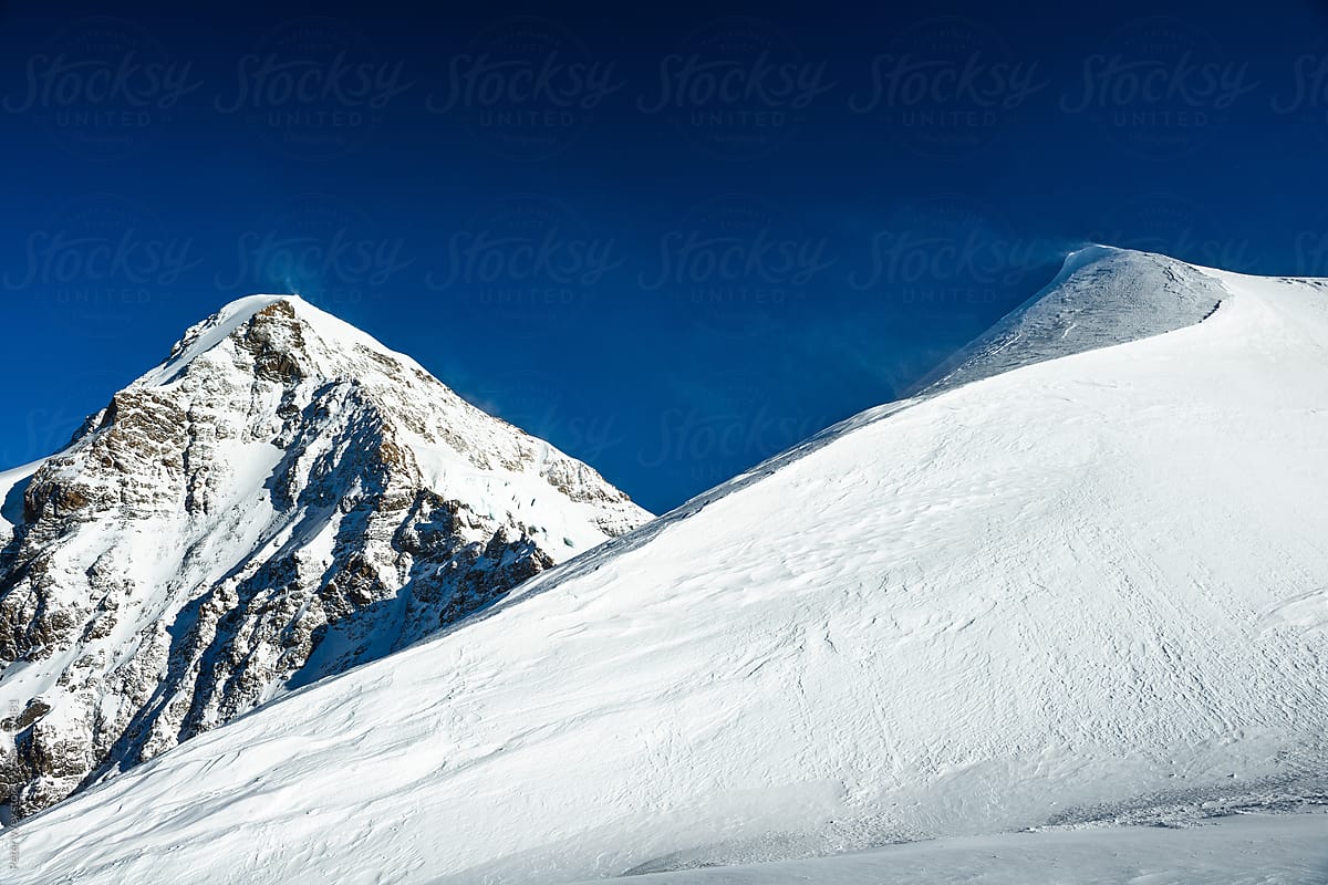 "Mönch Mountain Peak" by Stocksy Contributor "Peter Wey" - Stocksy