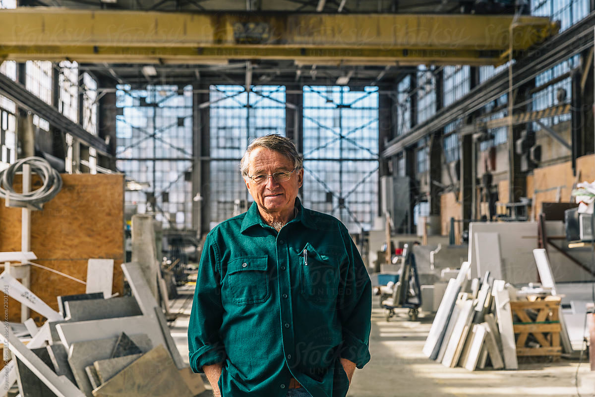 "Portrait Of Senior Citizen Worker At Industrial Warehouse" by Stocksy ...
