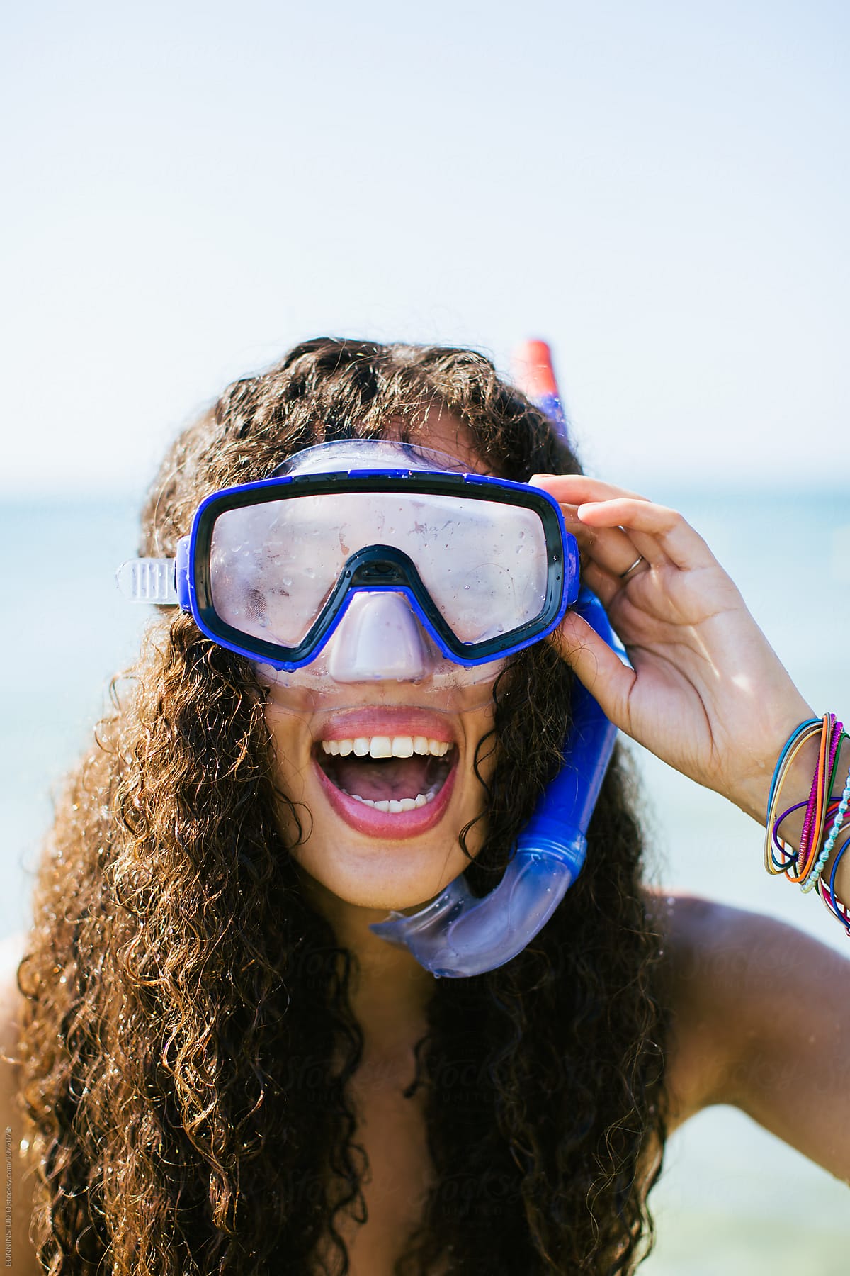 "Portrait Of A Woman With A Diving Mask On The Beach." by Stocksy ...