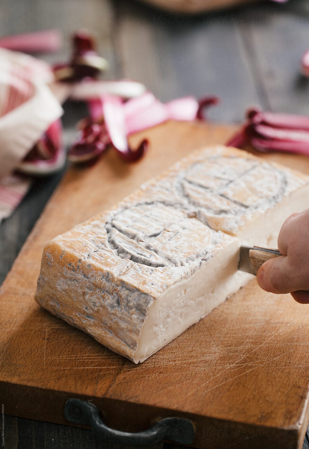 "Typical Italian Cheese" by Stocksy Contributor "Davide Illini" - Stocksy