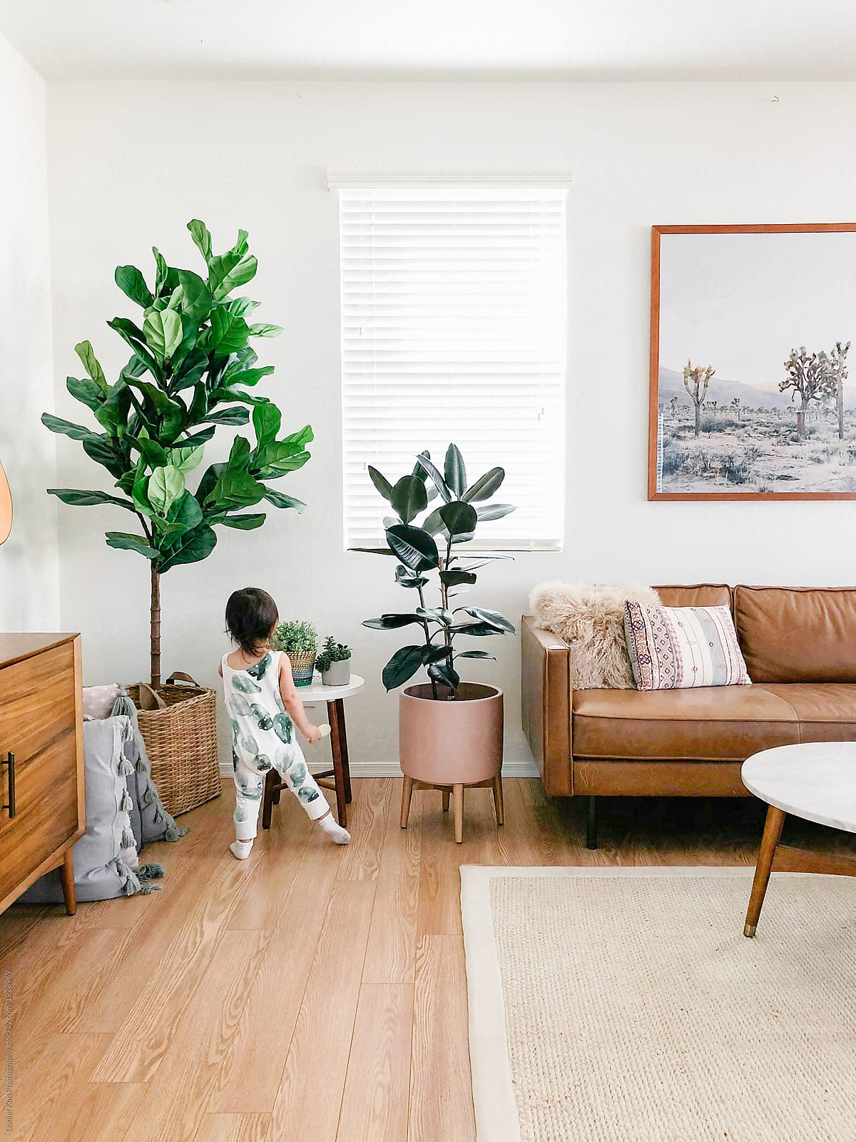 "Baby Playing In Living Room In House" by Stocksy Contributor "Daniel ...