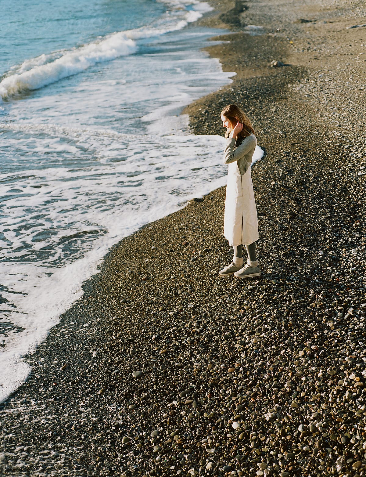 "Woman At The Seashore" by Stocksy Contributor "Amor Burakova" - Stocksy