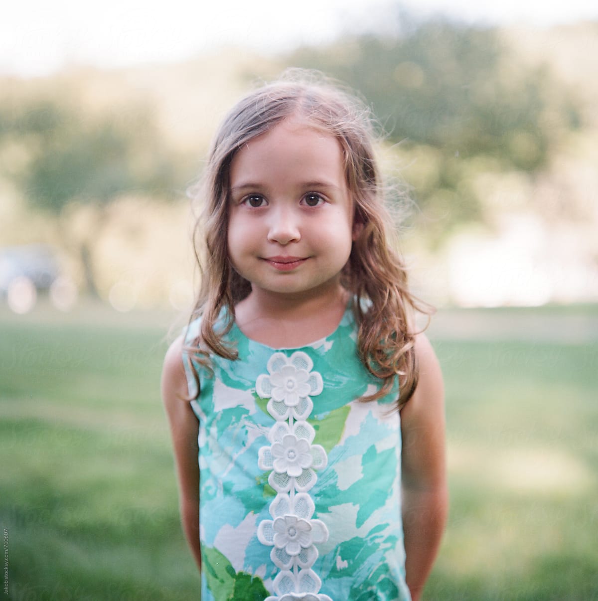 "Portrait Of A Beautiful Young Girl In A Dress" by Stocksy Contributor ...