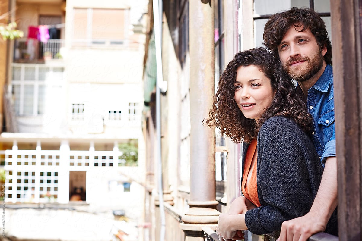 "Loving Couple Looking Through Window" by Stocksy Contributor "ALTO ...