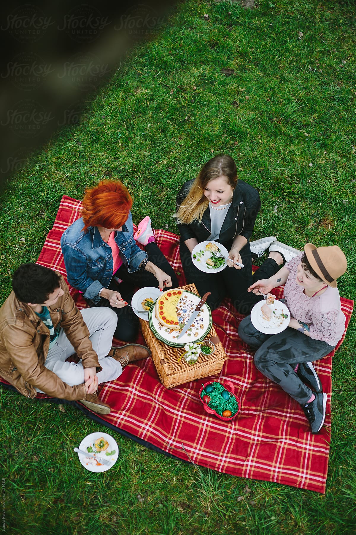 "Four People Having Picnic On Grass Outdoors" by Stocksy Contributor ...