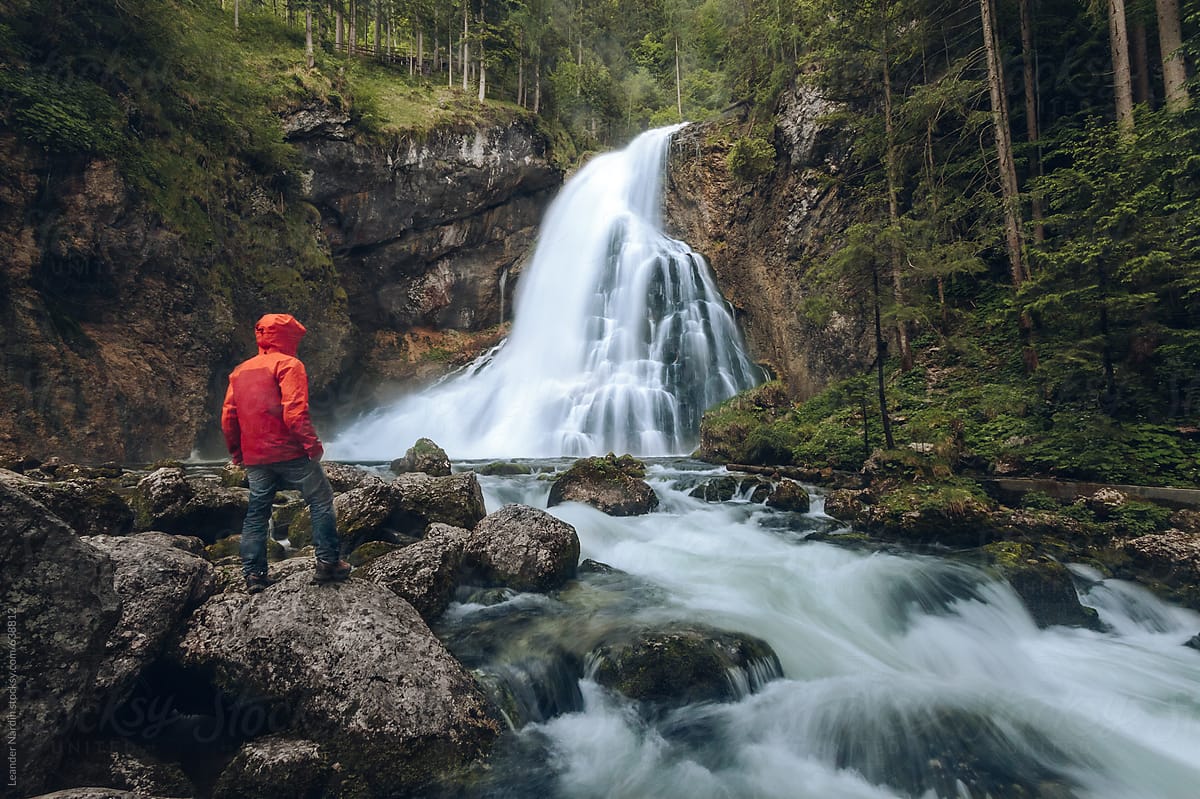 "Male Hiker In Front Of A Waterfall In The Forest" by Stocksy ...