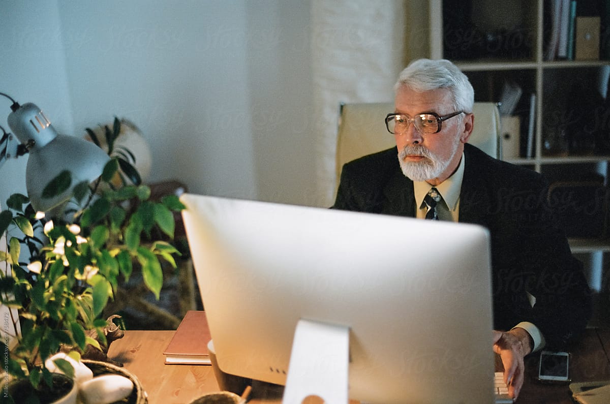 "Man Working At Office" by Stocksy Contributor "Milles Studio" - Stocksy