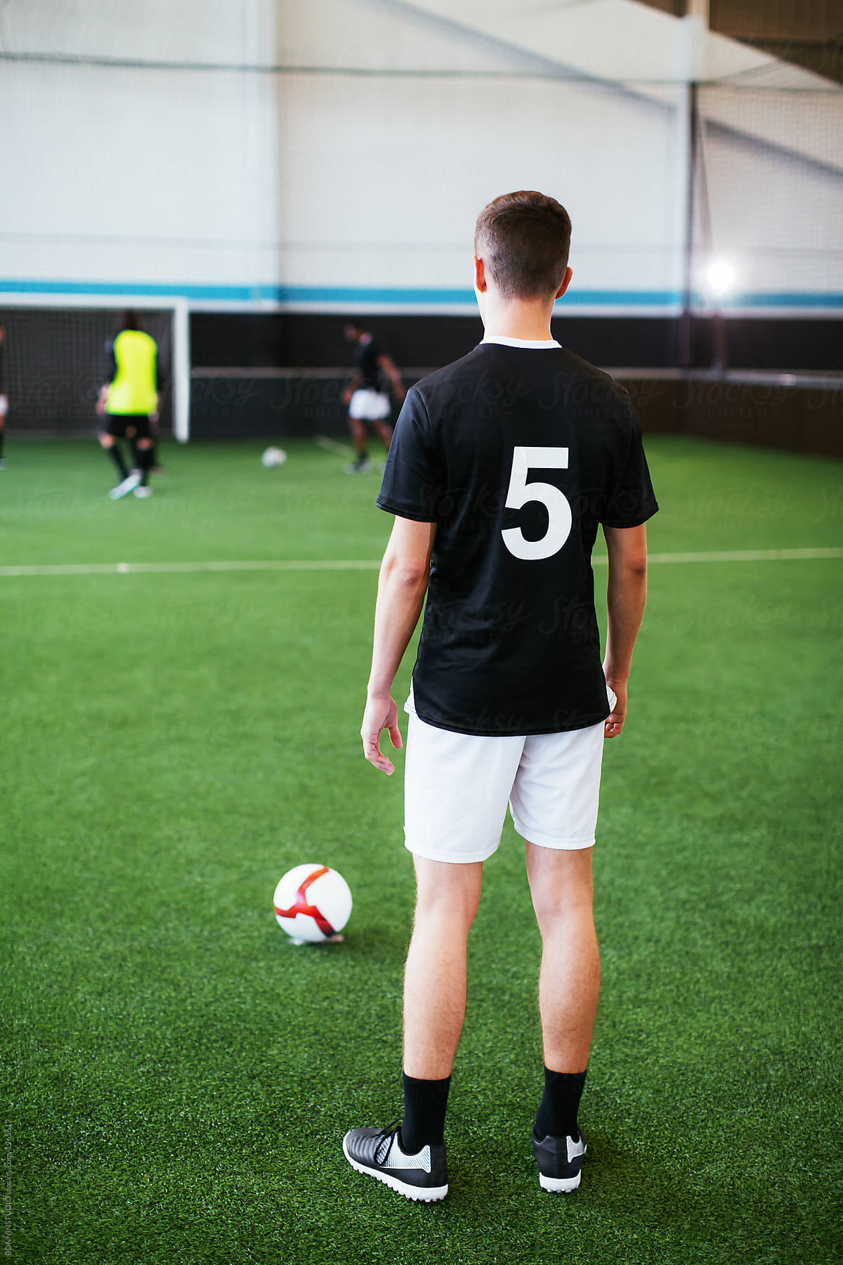 "Soccer Player Training In Football Field." by Stocksy Contributor ...