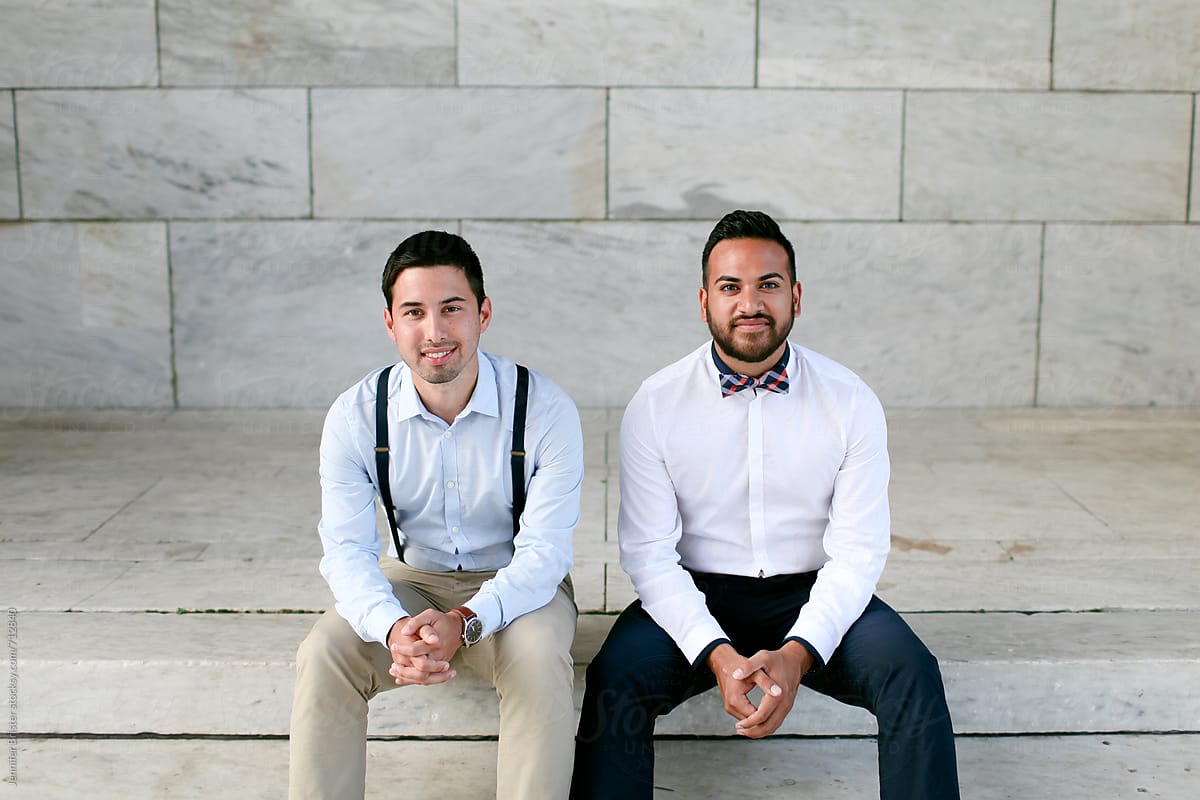 "Two Men Sit In Front Of White Marble Wall." by Stocksy Contributor ...