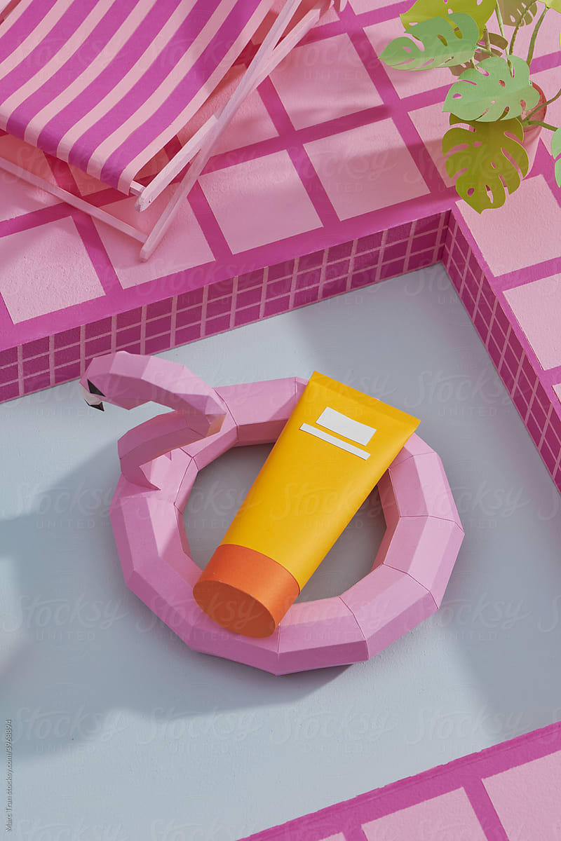 "Sunscreen Bottle Floats On Inflatable Circle On Pool." by Stocksy ...