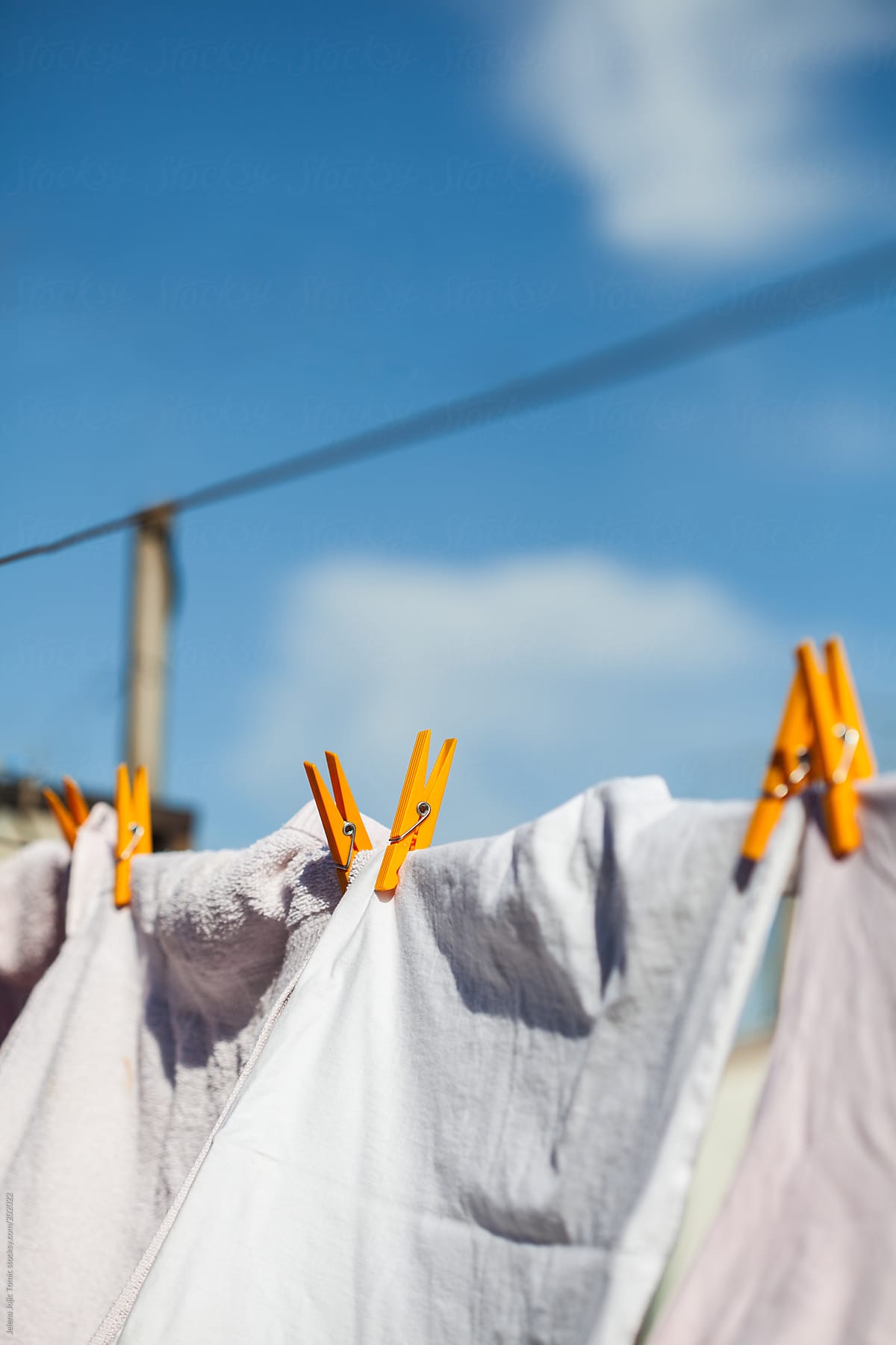 "Drying Laundry On The Clothesline" by Stocksy Contributor "Jelena ...