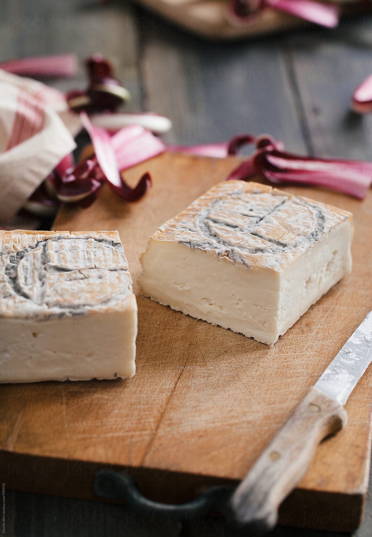 "Typical Italian Cheese" by Stocksy Contributor "Davide Illini" - Stocksy