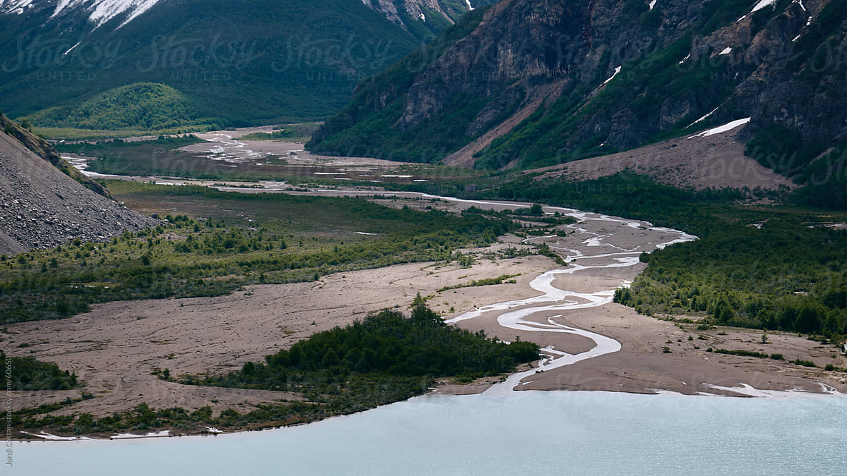 "Winding River Valley" by Stocksy Contributor "Jordi Castan" - Stocksy