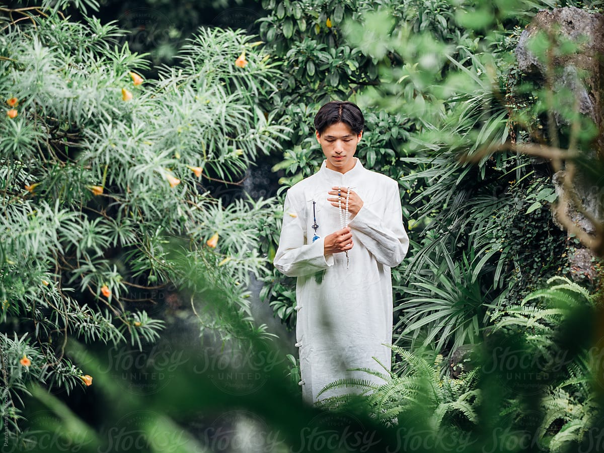 "Asian Man With Zen Buddha Gesture" by Stocksy Contributor "Pansfun ...
