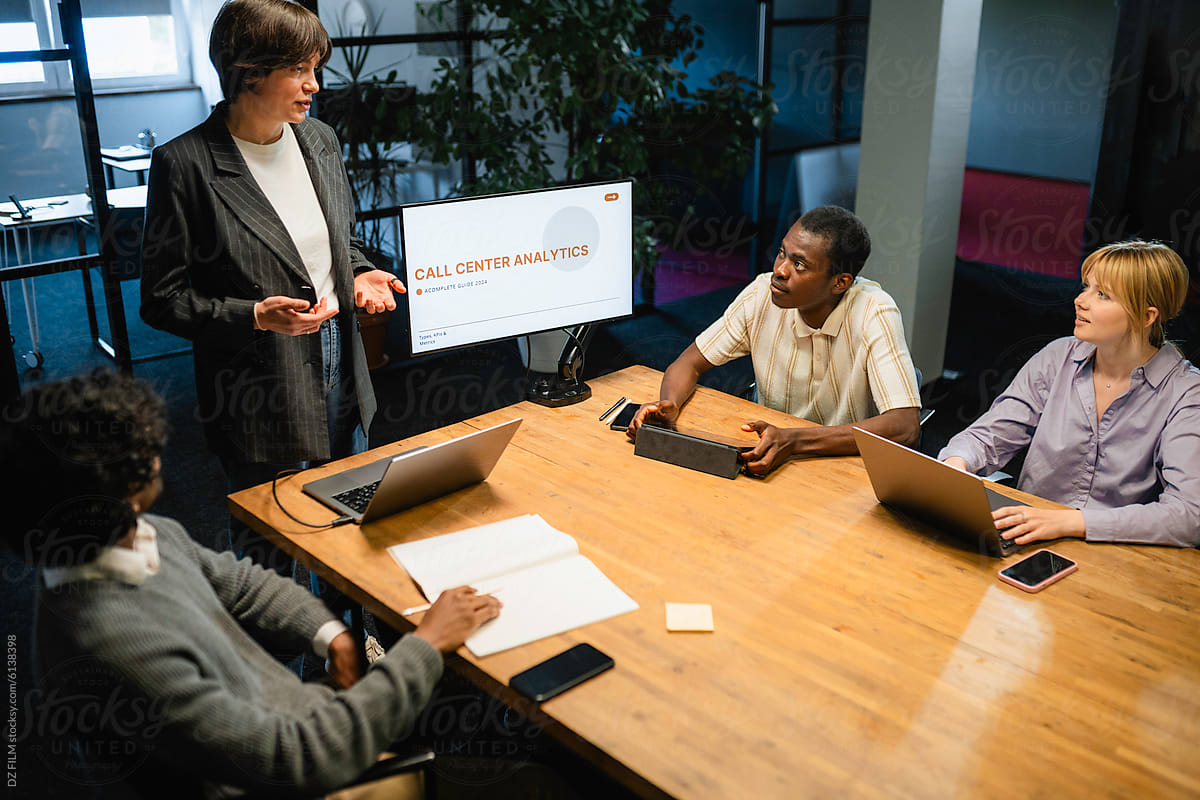 "Meeting In The Office" by Stocksy Contributor "DZ FILM" - Stocksy