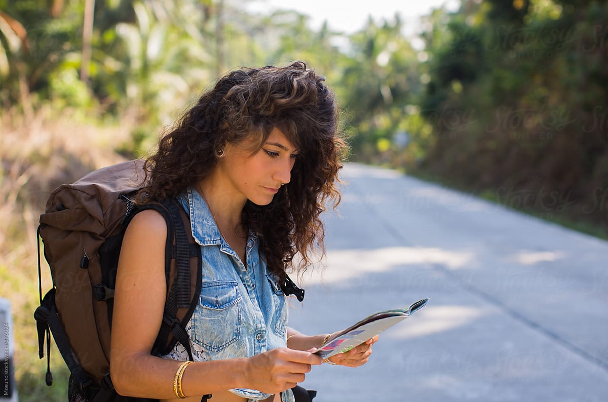 "Female Backpacker Checking The Map" by Stocksy Contributor "Mosuno ...